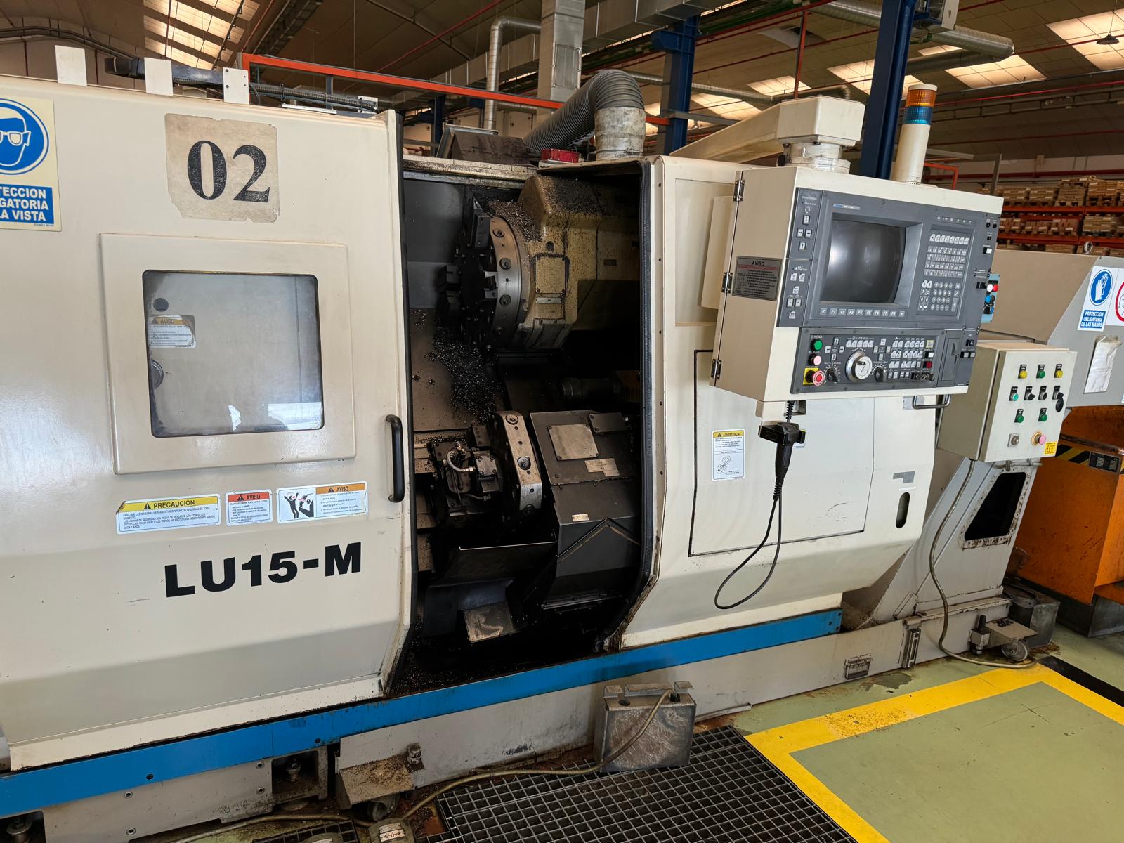 Un Torno Control Numerico marca OKUMA modelo LU-15M-2SC - IAG Auction